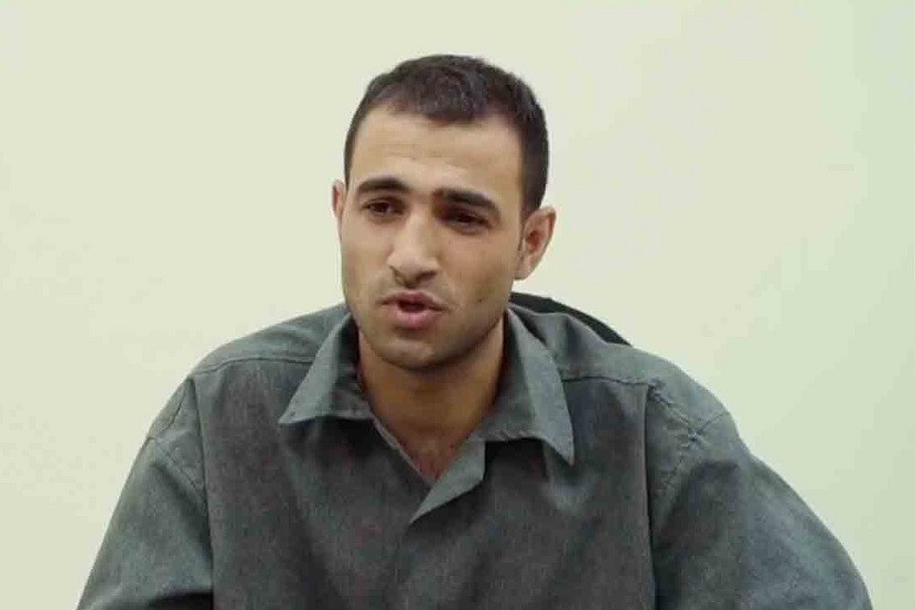 A political prisoner convicted of murdering a police officer in Iran ...