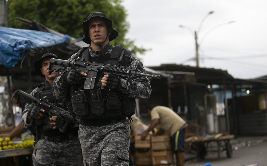 Bloody police raid on favelas in Rio de Janeiro leaves at least nine ...