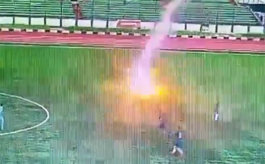 The moment lightning strikes a football player during a match in ...