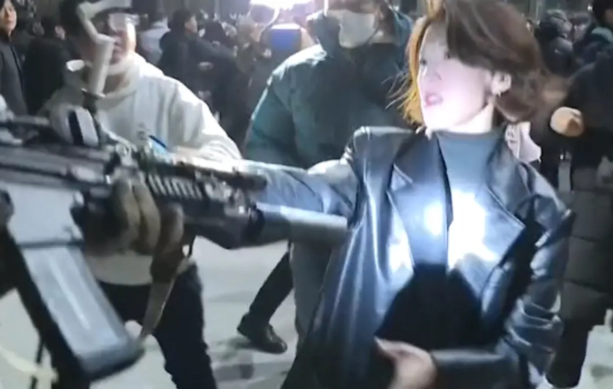 South Korea: 'Fearless' lawmaker grabs soldier's gun outside parliament ...